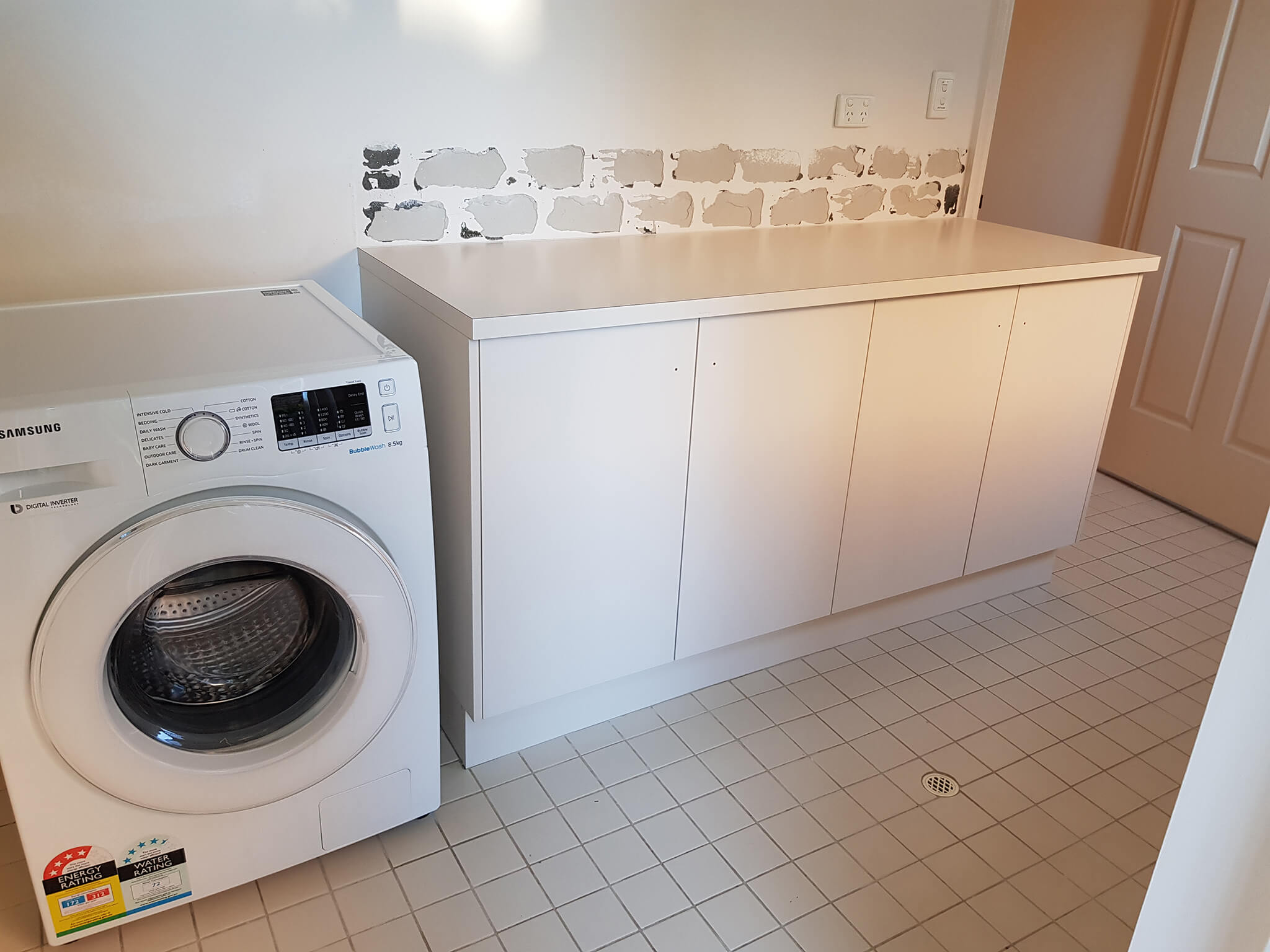 Killer Carseldine laundry makeover • Superior Benchtops
